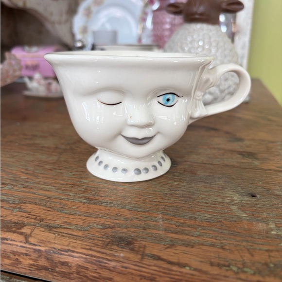 Source Unknown | Accents | Source Unknown Cream And Blue Winking Face ...